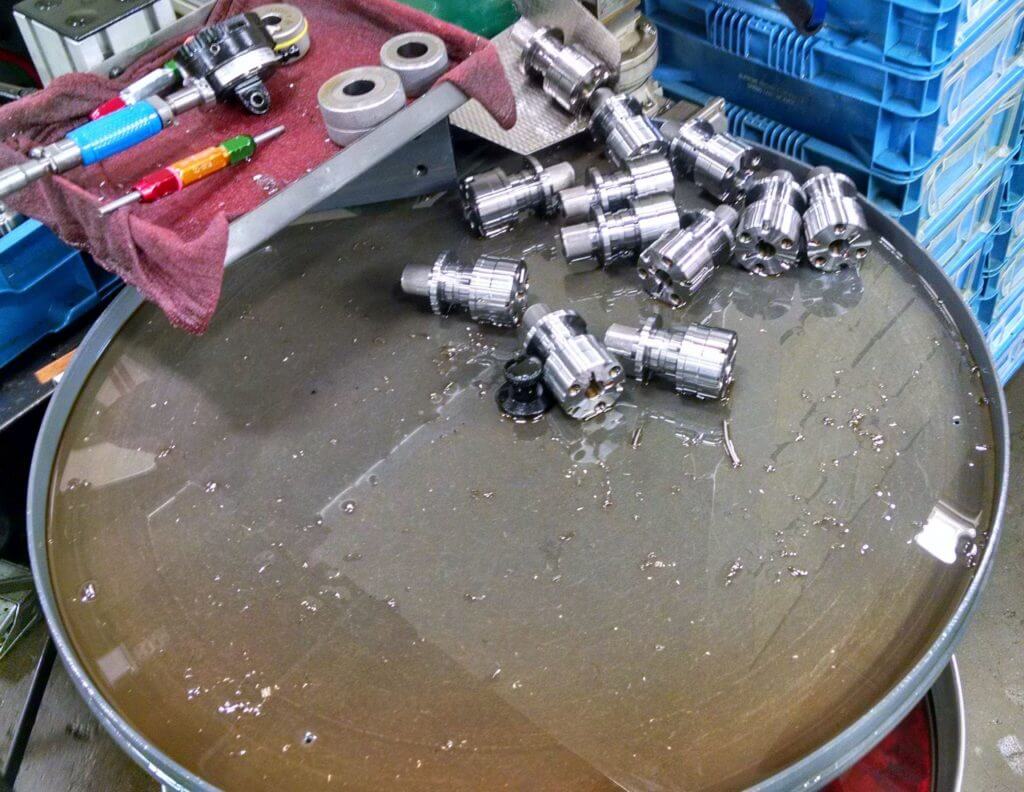 Mini-Mover RTAs Catch Those Oily Parts and Fluids - Mini-Mover Conveyors