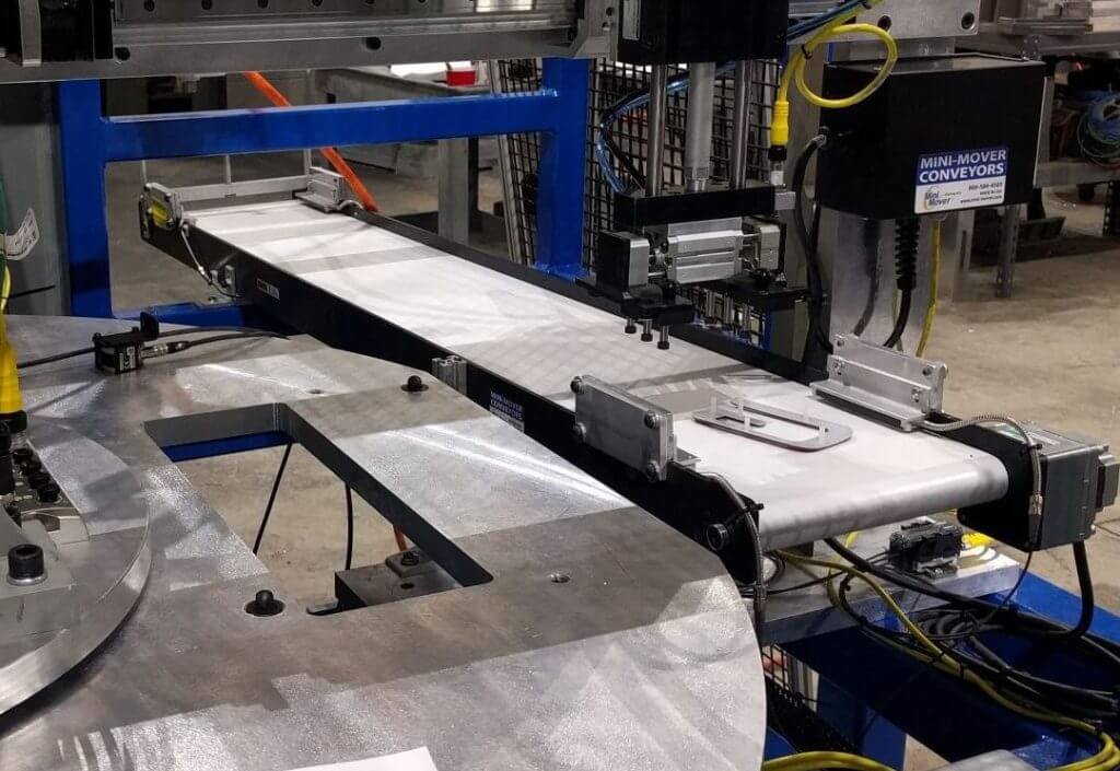 Integrator's Sonic Weld Station Uses Lite Series - Mini-Mover Conveyors