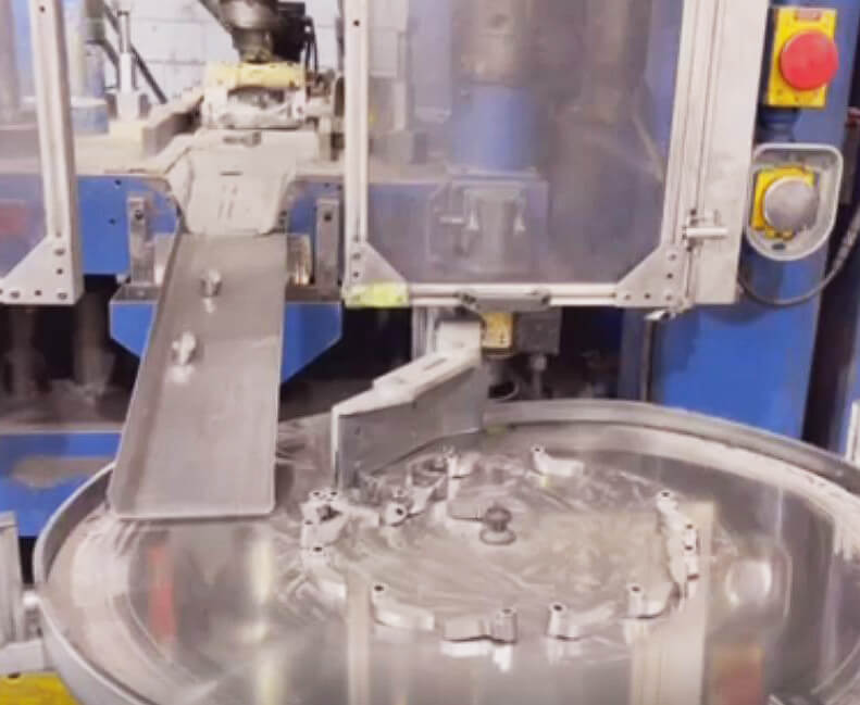 Huge Labor Savings for Powdered Metal Presses - Mini-Mover Conveyors